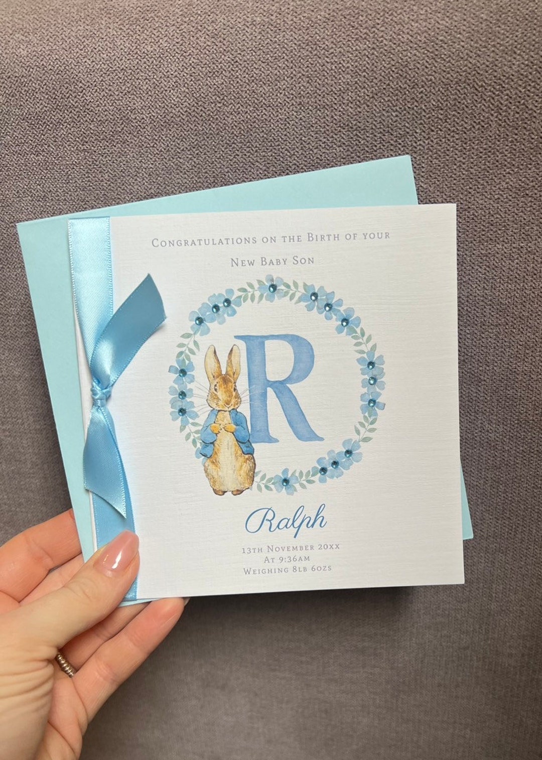 Personalised Handmade Peter Rabbit New Baby Card, Flower Wreath, Blue ...
