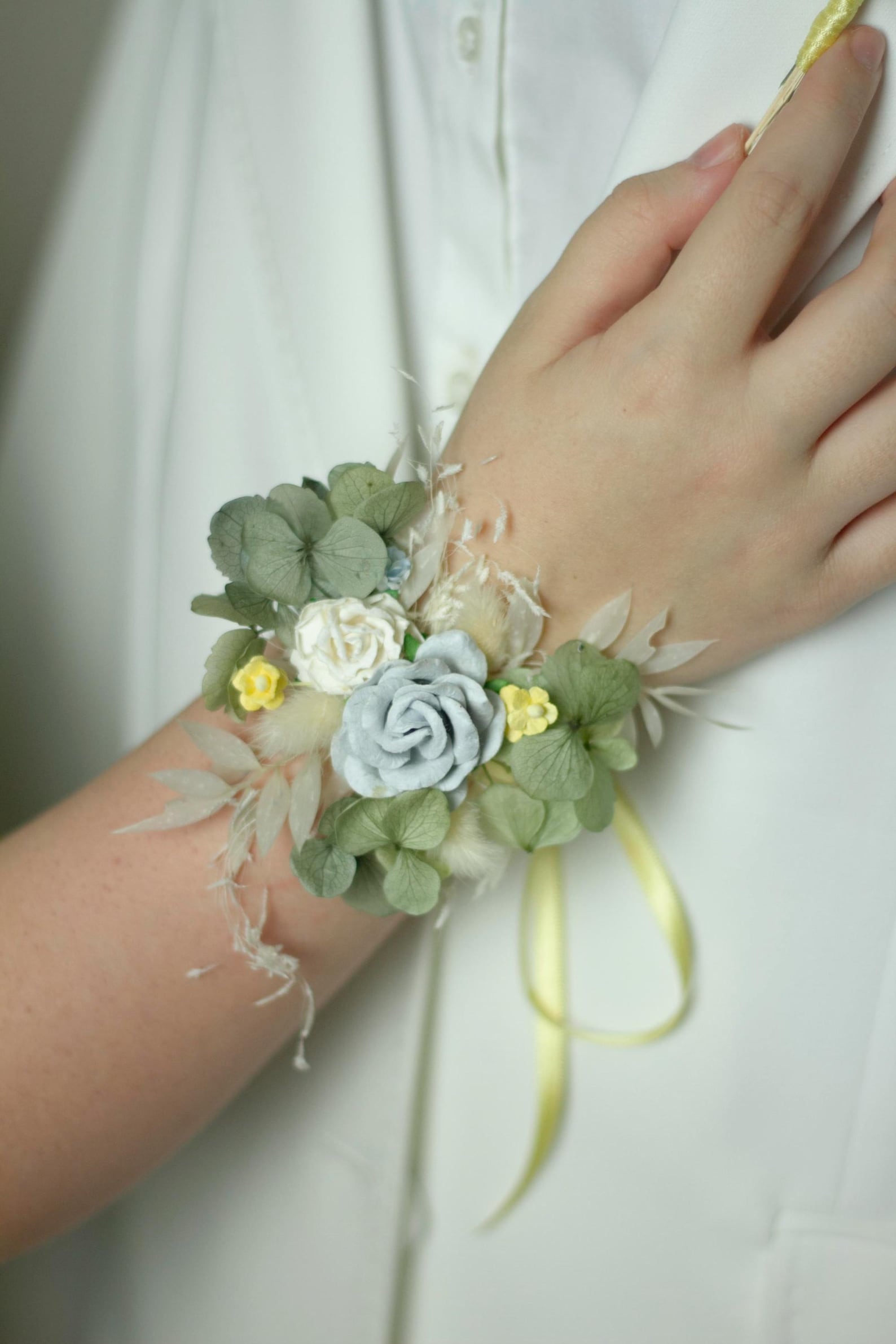 Sophisticated Boutonniere in Baby Blue, Pastel Yellow, Aqua Green, and ...