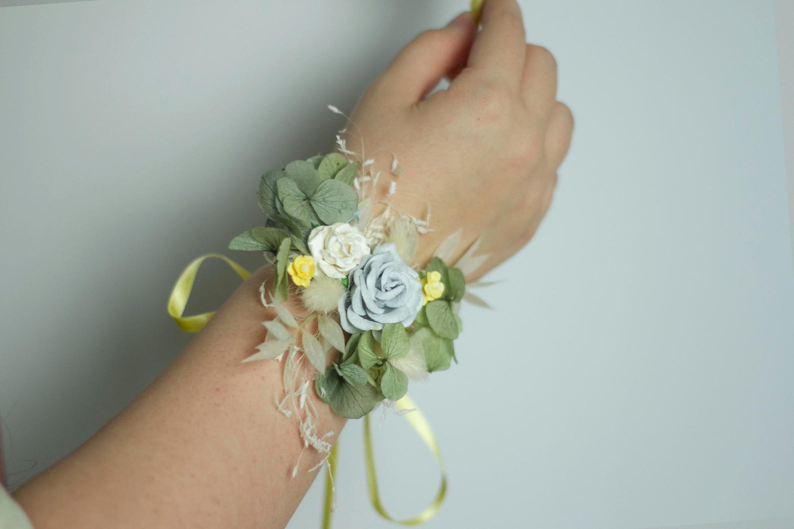 Sophisticated Boutonniere in Baby Blue, Pastel Yellow, Aqua Green, and ...