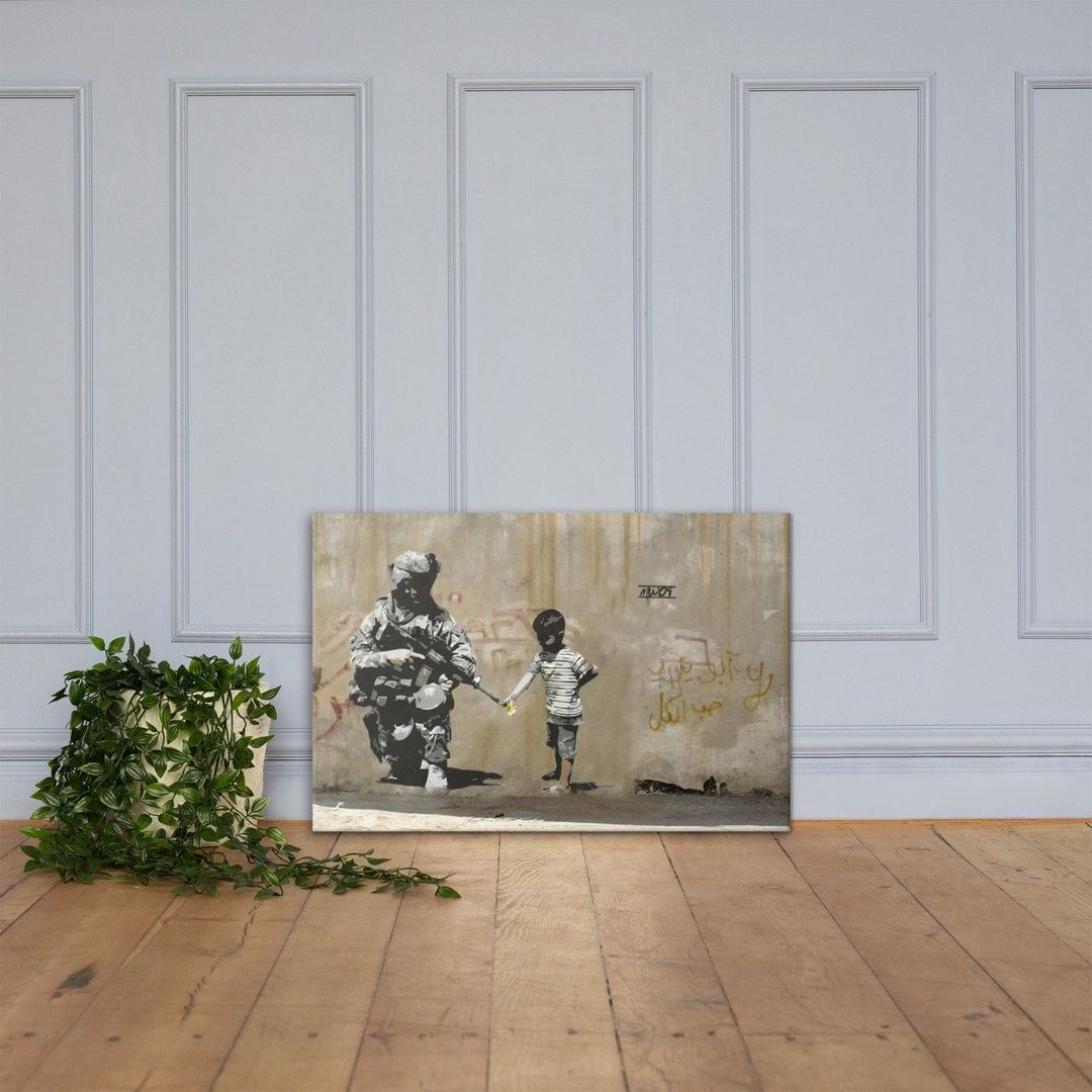 Banksy Boy Loading Soldier's Gun With Flower - Street Graffiti Art ...