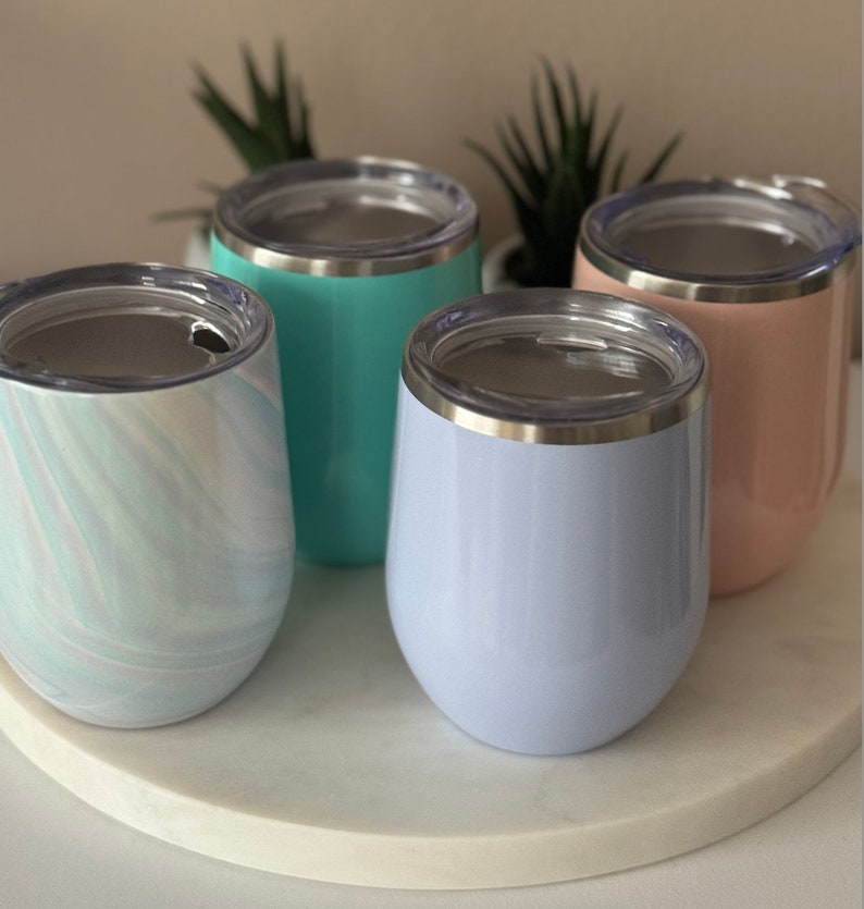 Different Colored Personalized, Sustainable Togo Thermo Cups for on the ...