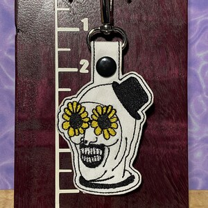 Art Clown Terrifier Sunflower Glasses Swivel Keychain White Pearlescent ...