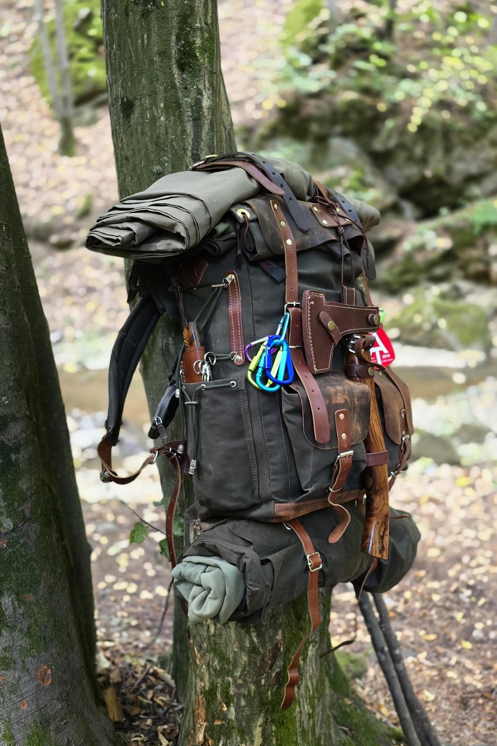 Carry Your Stories | Backpack | Black-brown-green-white | 30L to 80 L ...