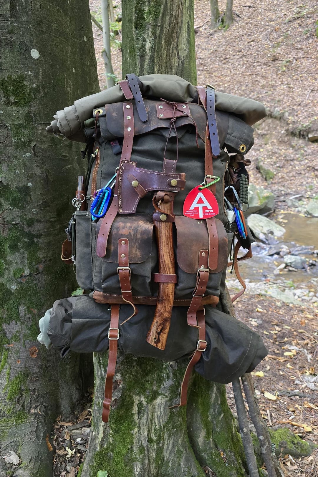 Carry Your Stories | Backpack | Black-brown-green-white | 30L to 80 L ...