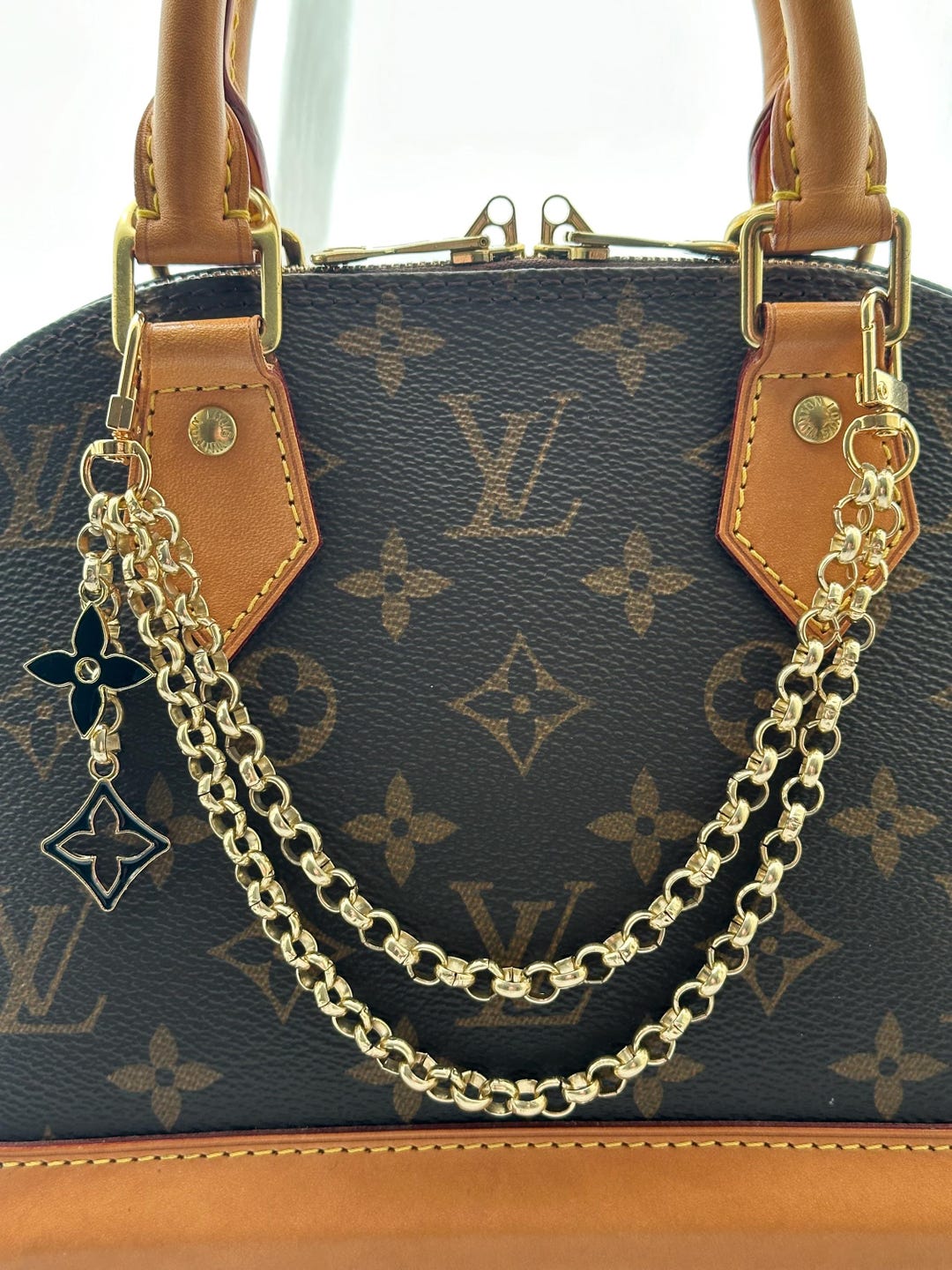 Double Chain Bag Charm. Gold Tone Metal Chains With Black Clover Charms ...