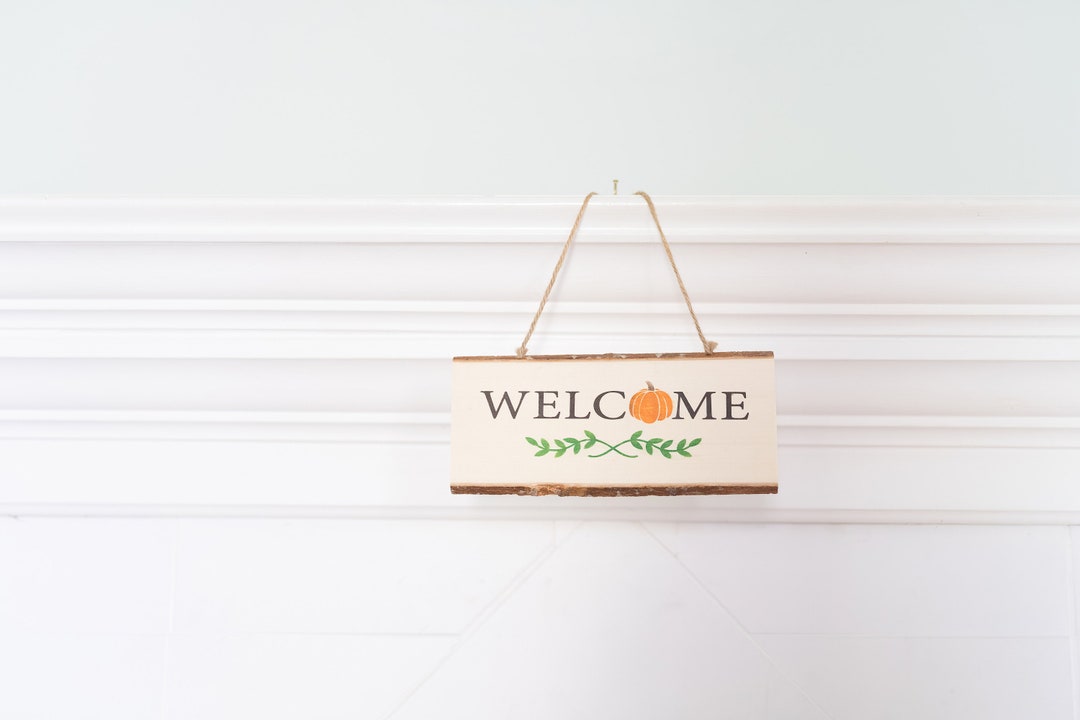 Wood Sign With a Rope Hanger. Cream Background With Dark Brown ...