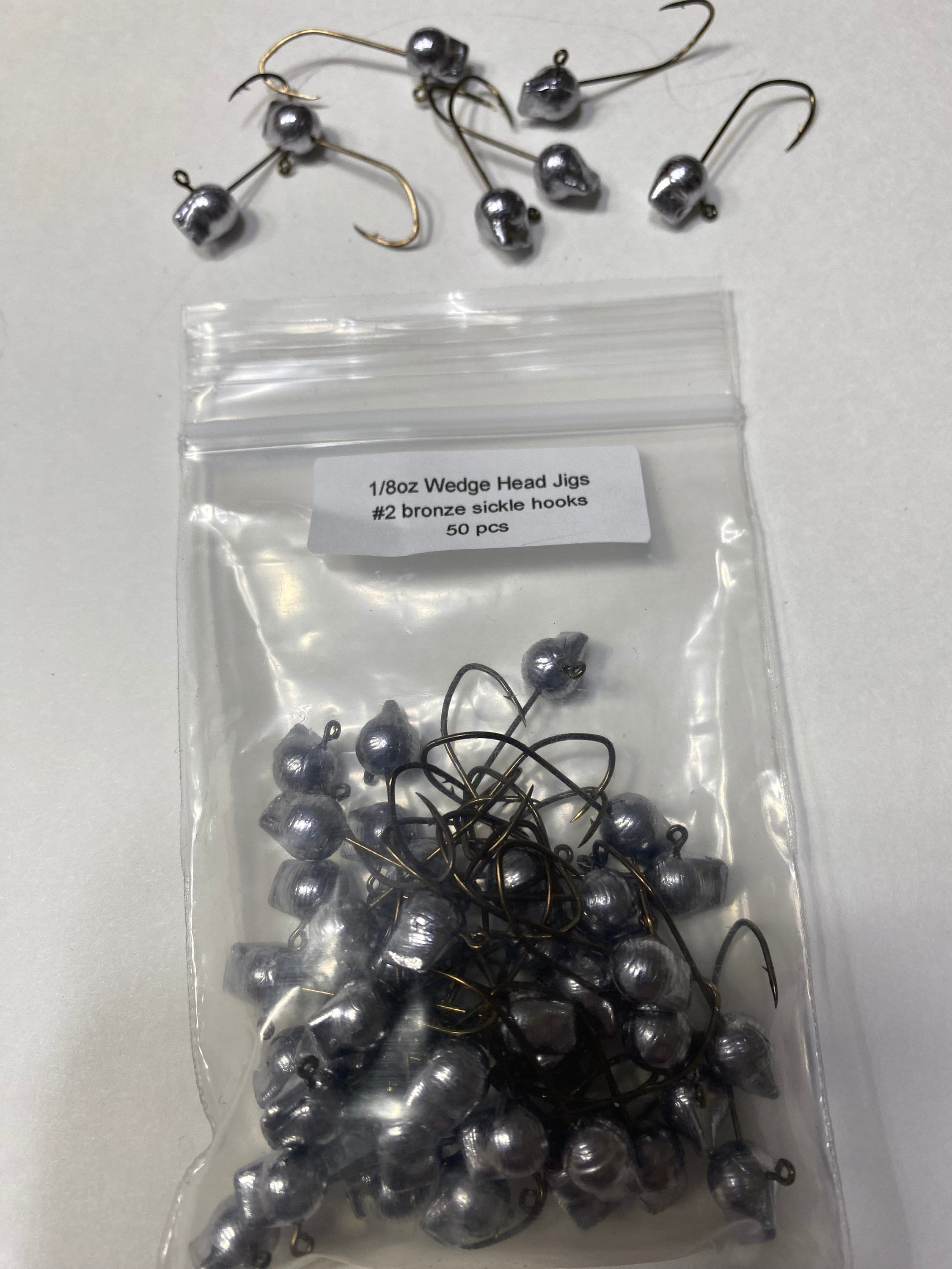 50 Unpainted Wedge Head Jigs With No Collar and Bonze Sickle Hooks ...