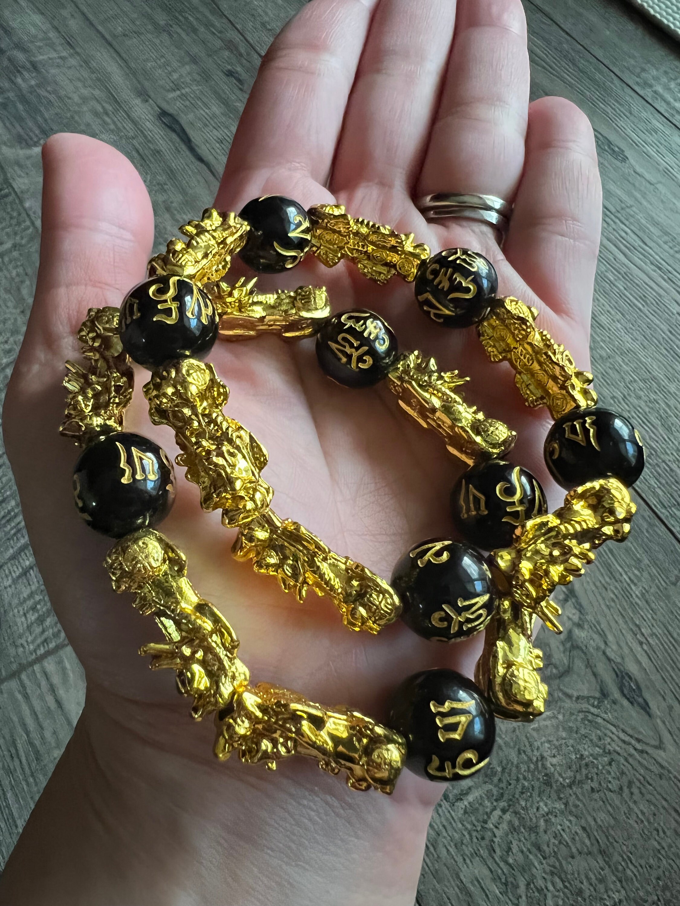 Feng Shui Hand Carved Obsidian Mantra Bead Bracelet w 6 24K Overlay Gold Pixiu or Piyao Attracts Wealth Luck