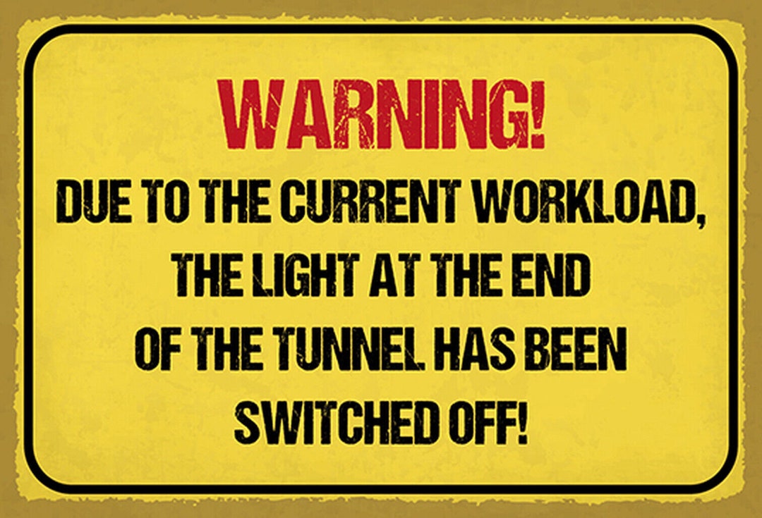 Sign Saying Warning Due to the Current Workload Warning Because of ...