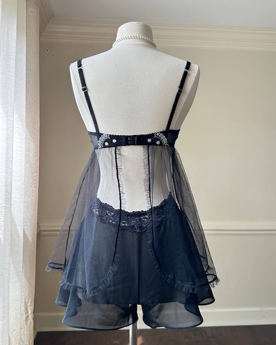 Victoria’s Secret sheer open top featuring satin bust… - Gem