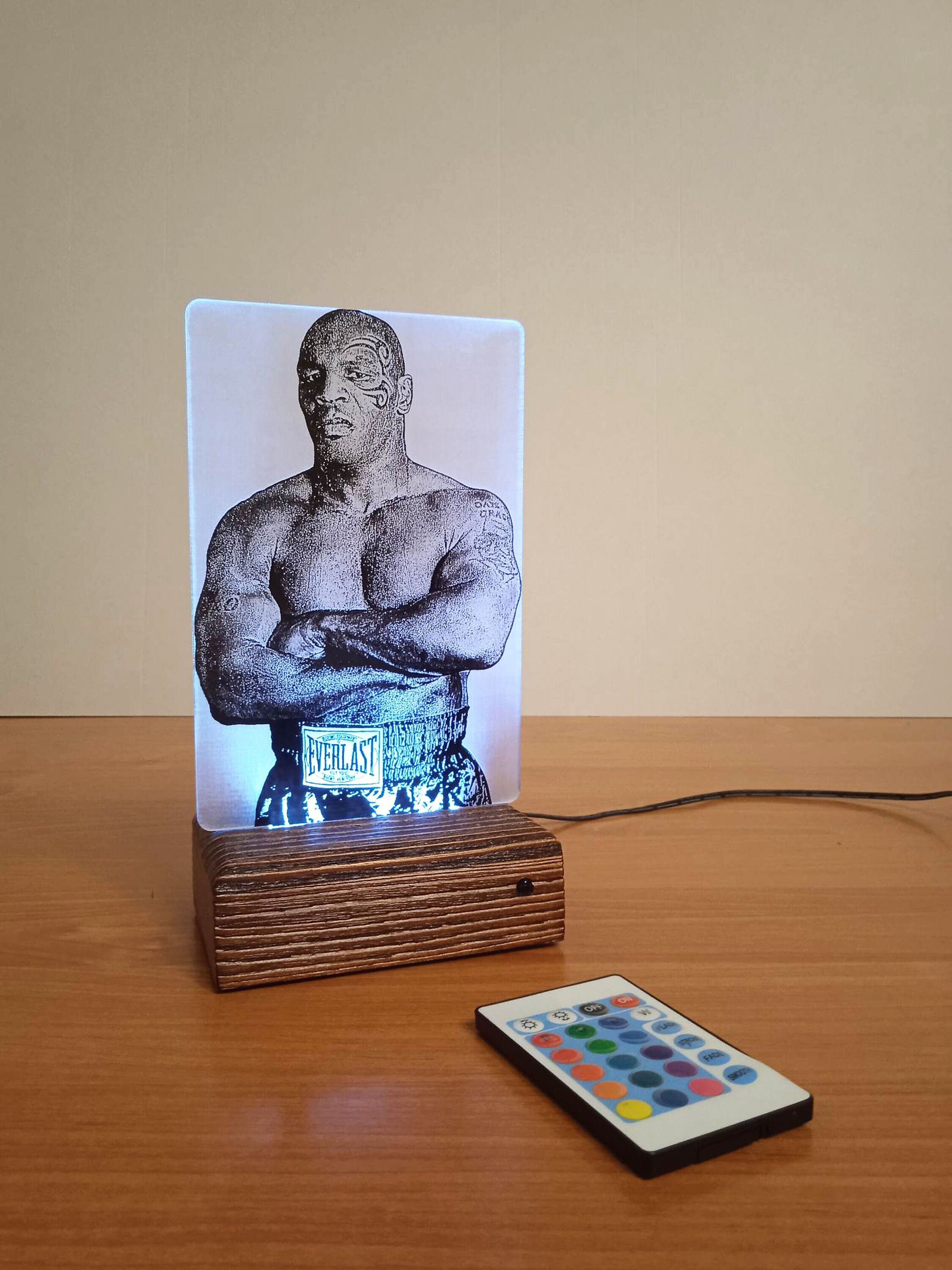 Mike Tyson on a Wooden LED Stand With Remote Control. Mike Tyson ...