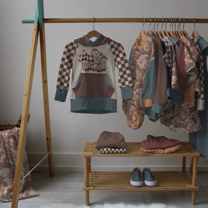 Clothing Rack Realistic Mockup, Hanging Clothes Display Mockup, Lowland ...