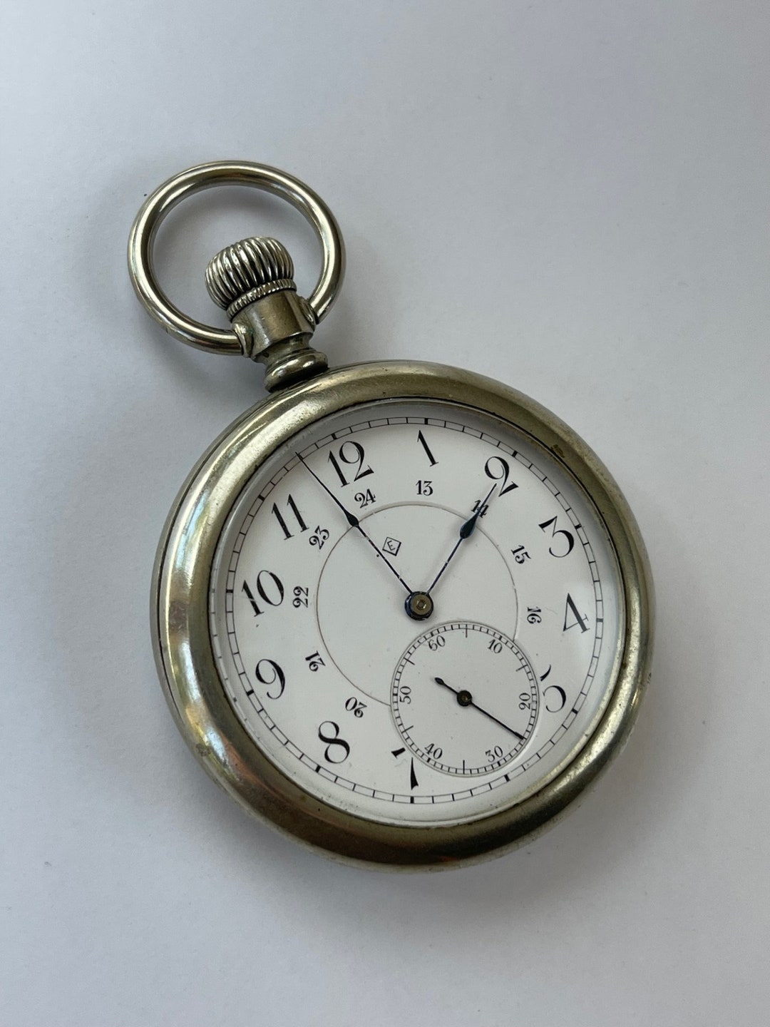 The T. Eaton & Co Limited Stainless Steel White Porcelain Dial Antique ...