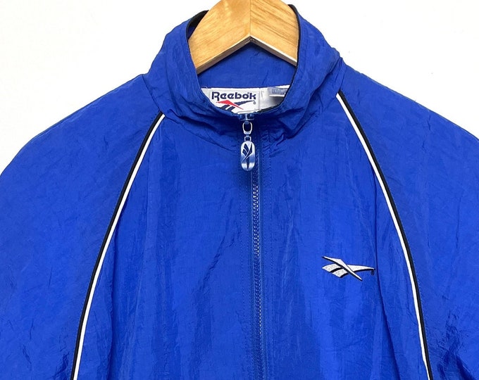 Vintage 1990s Reebok Delta Logo Windbreaker Jacket (size Adult Medium ...