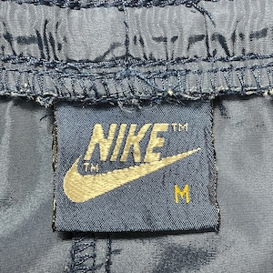 Vintage 1980s Nike Blue Tag Spell Out Swoosh Logo Windbreaker ...