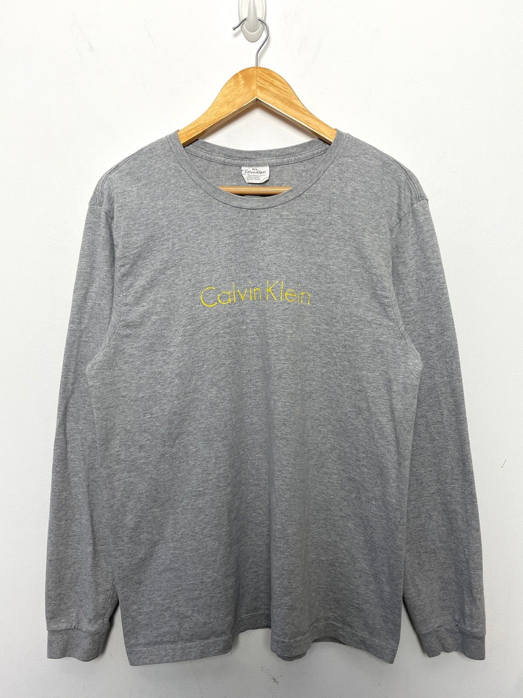 Vintage 1990s Calvin Klein Spell Out Graphic Long Sleeve Tee Shirt ...