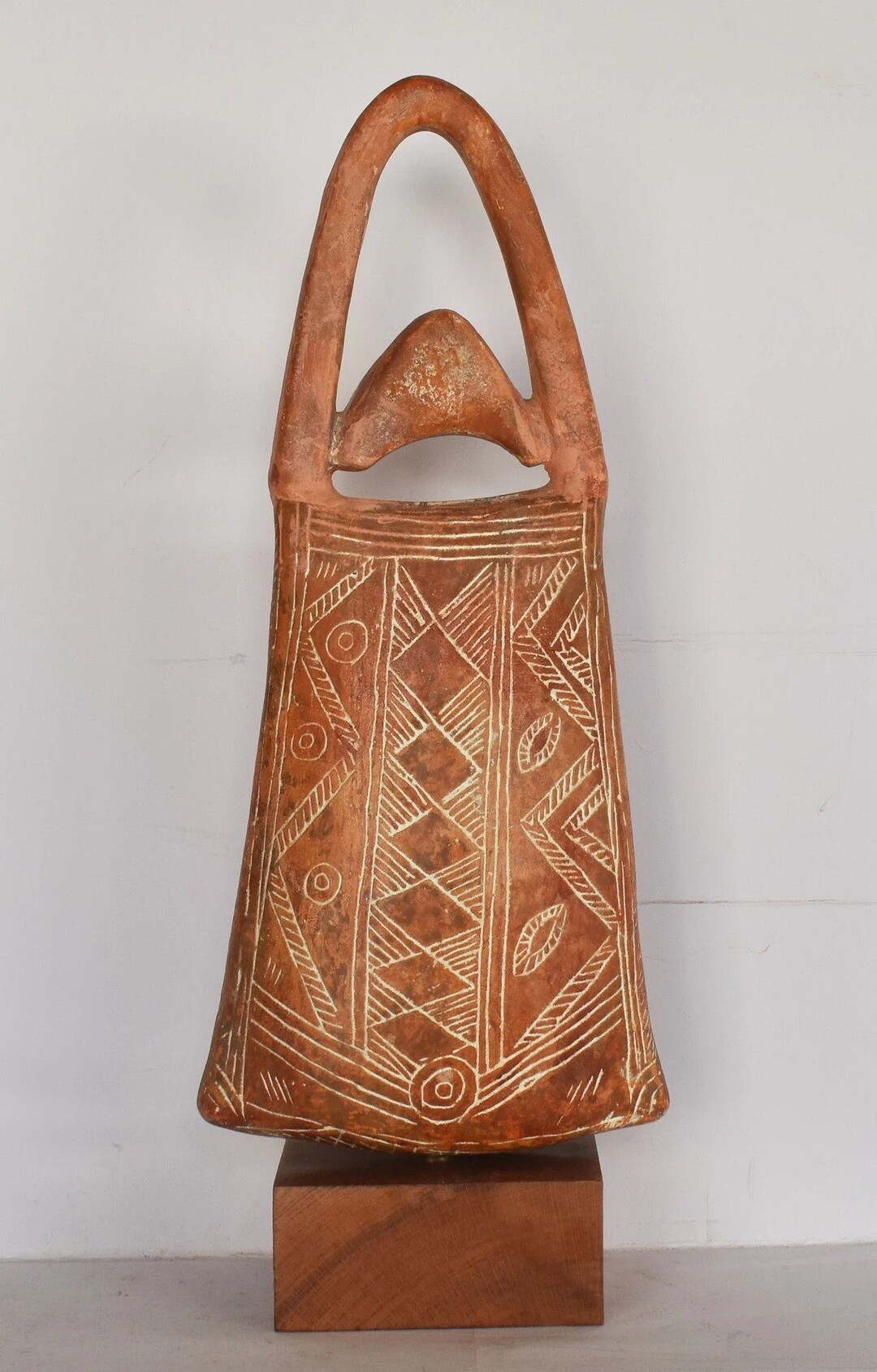 Vase in the Shape of a Leather Bag - Red Polished Ware With Incised ...