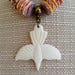 Beach Chic Rainbow Shell Bone Raven Necklace - Etsy
