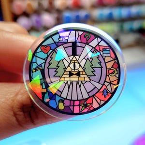 Badge of Bill Cipher • 2" Holographic Broken Glass Pin • Gravity Falls ...