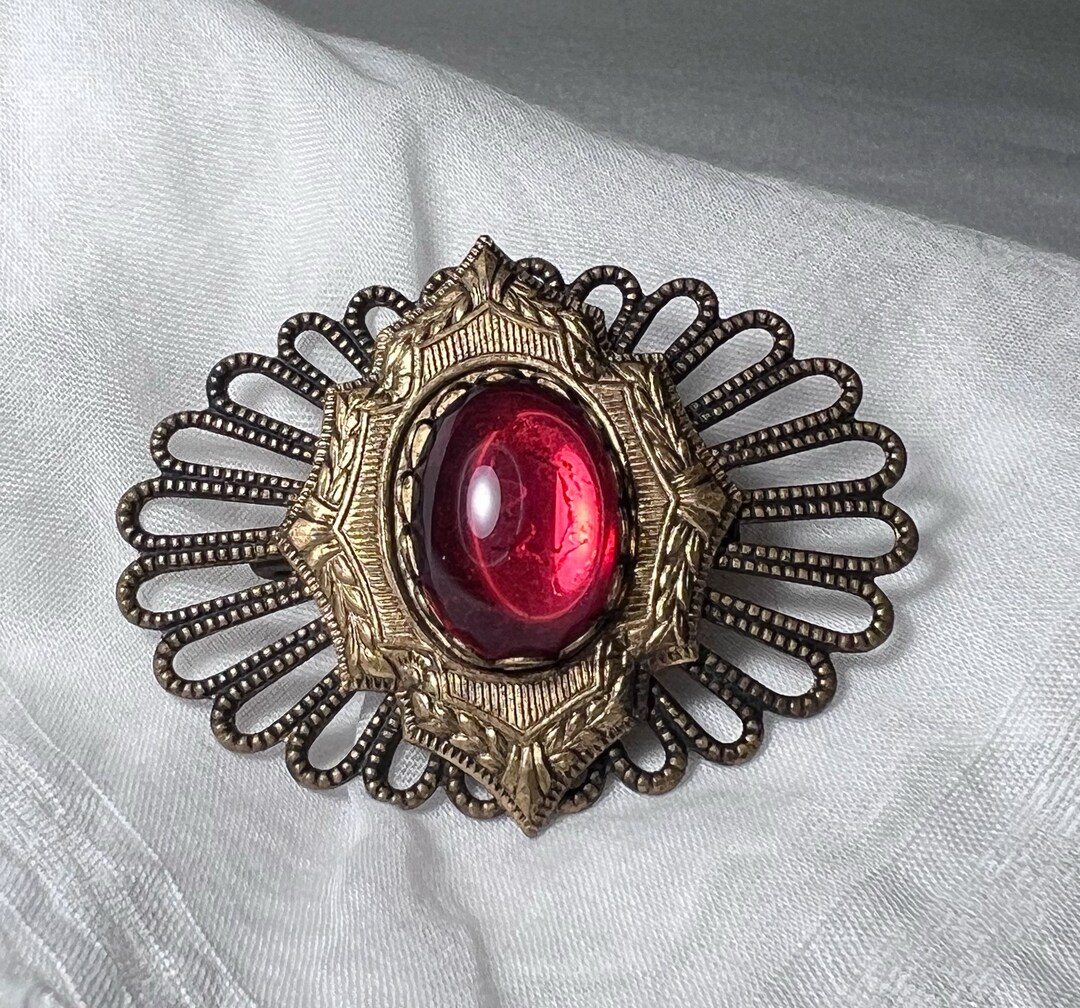 Vintage Engraved Medallion Brooch With 'ruby' Red Elliptical Glass ...