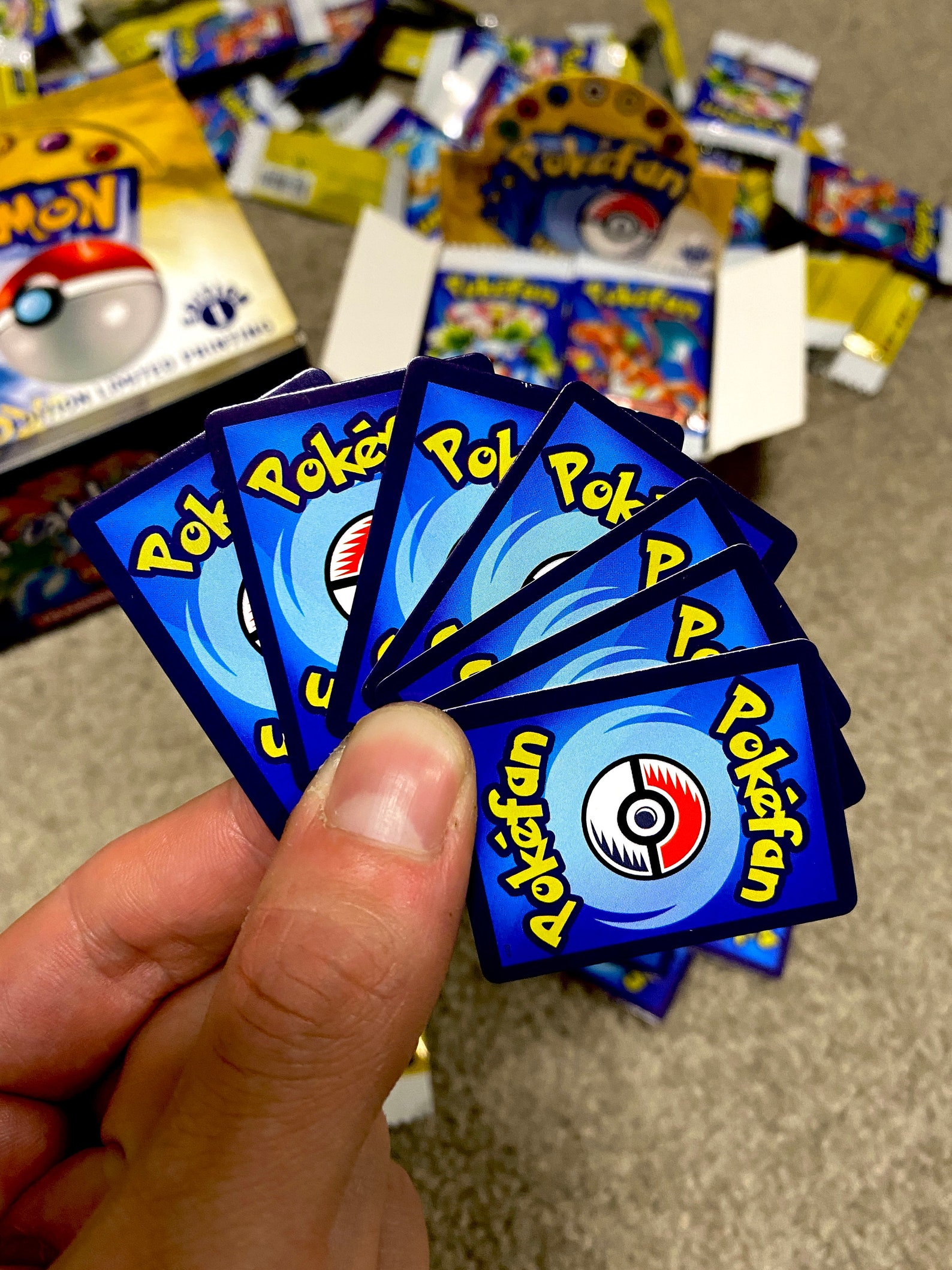 Not apart of the tcg community but why is the pokeball in the back side ...