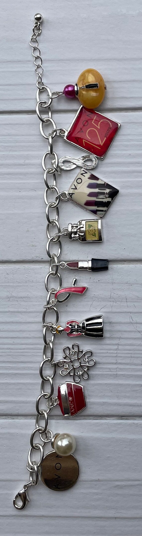 Vintage Avon 125 anniversary collection charm bracelet - Gem