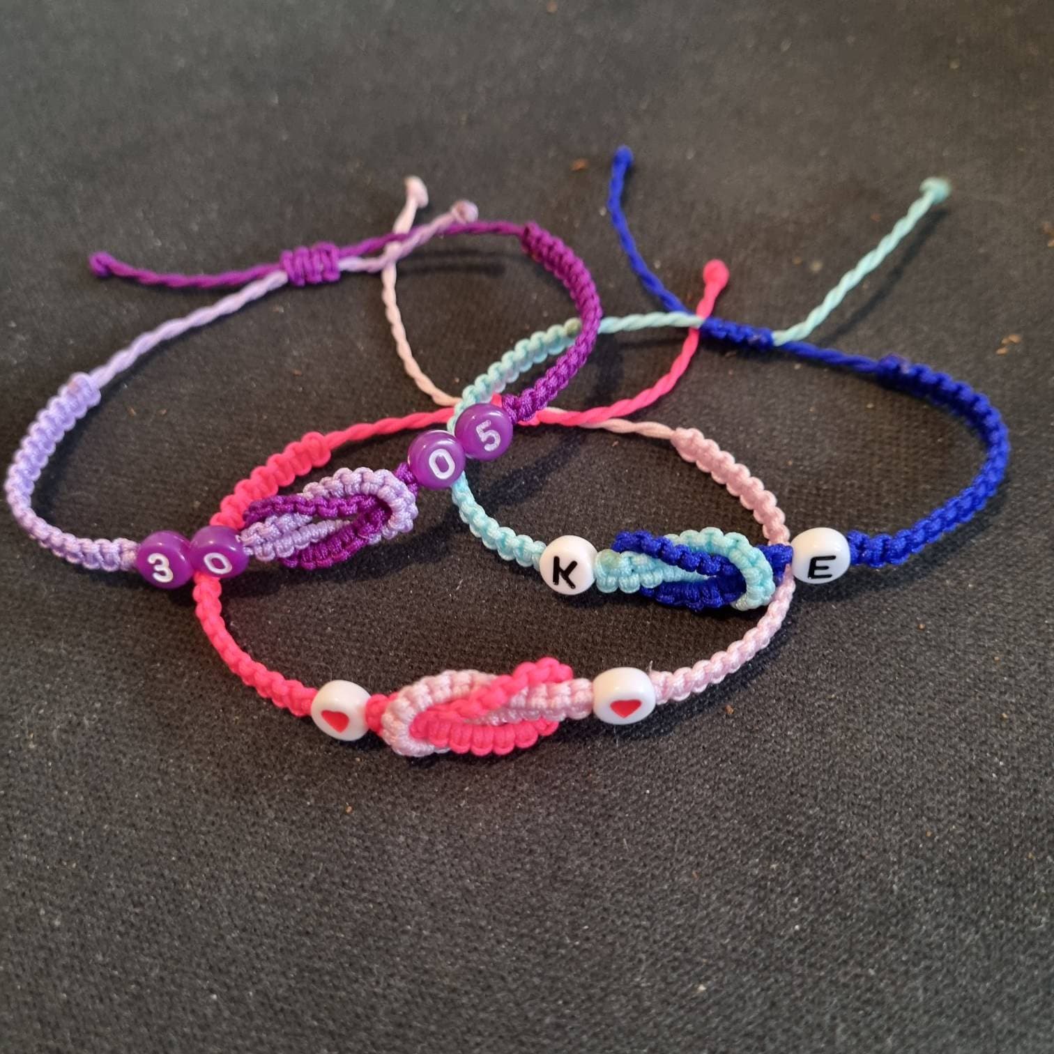 Colourful Macrame Infinity Bracelets With Letters, Hearts or Numbers ...
