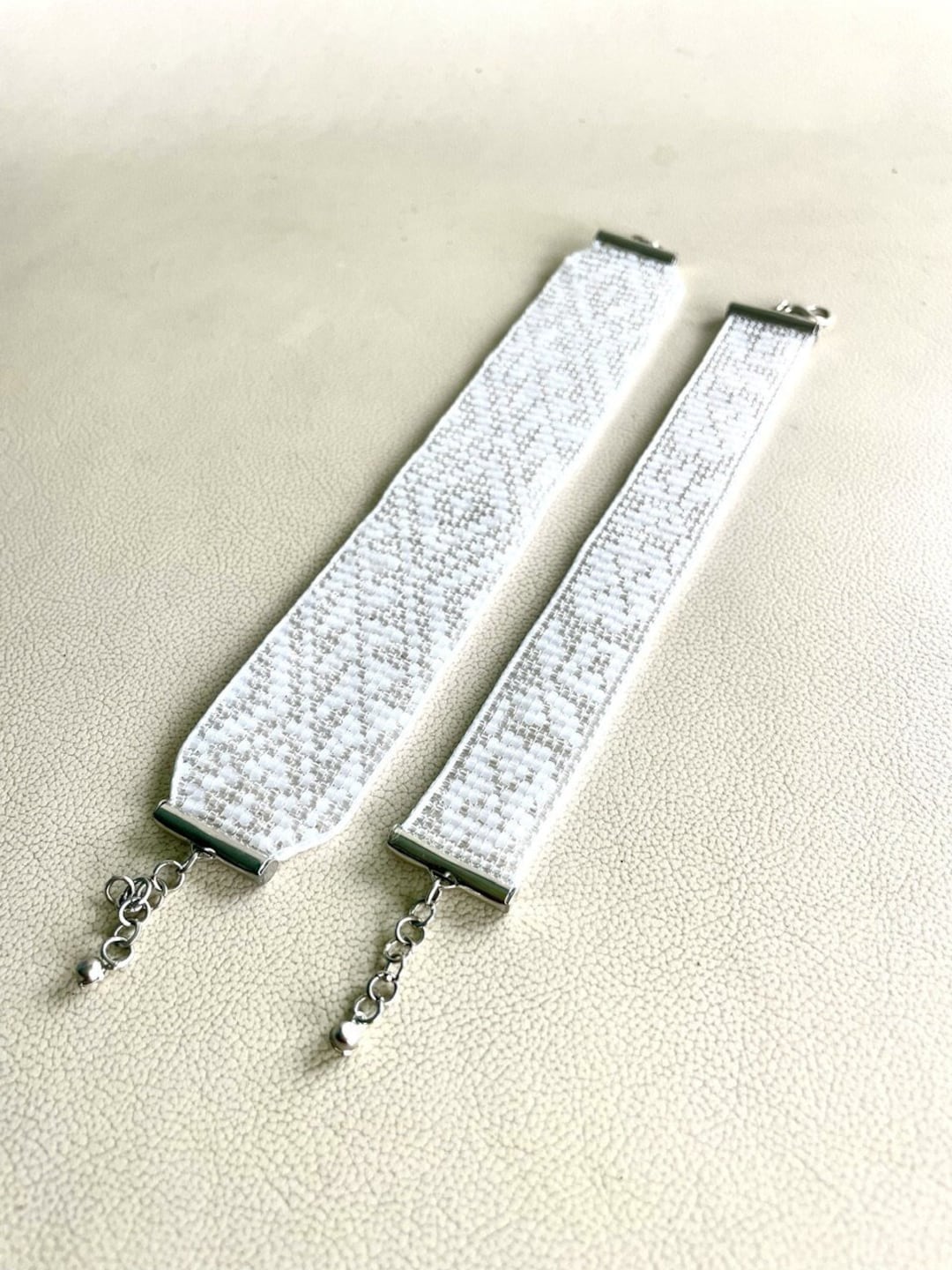 Delicate Set of Two Flat Bracelets Made of White and Transparent Beads ...