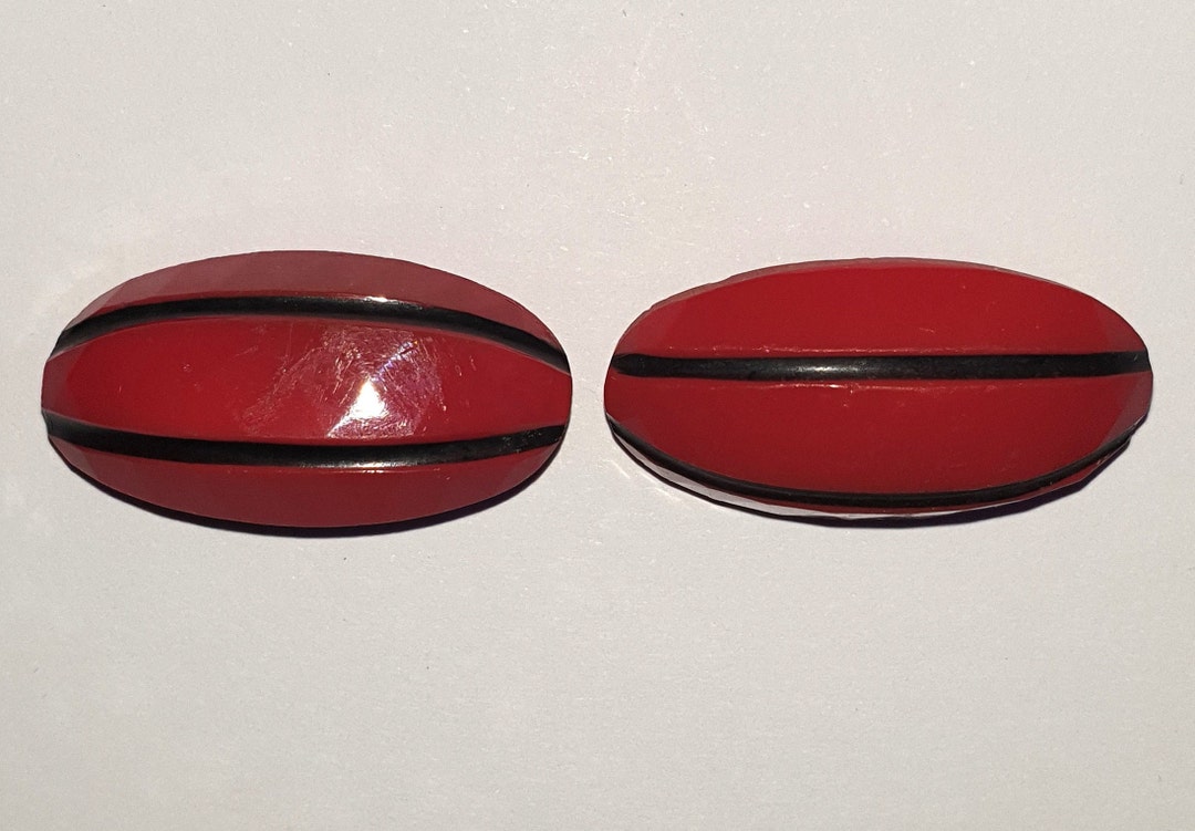 2 Red Glass Oval Buttons With 2 Black Grooves. Rugby Ball Shape. 4 Way ...