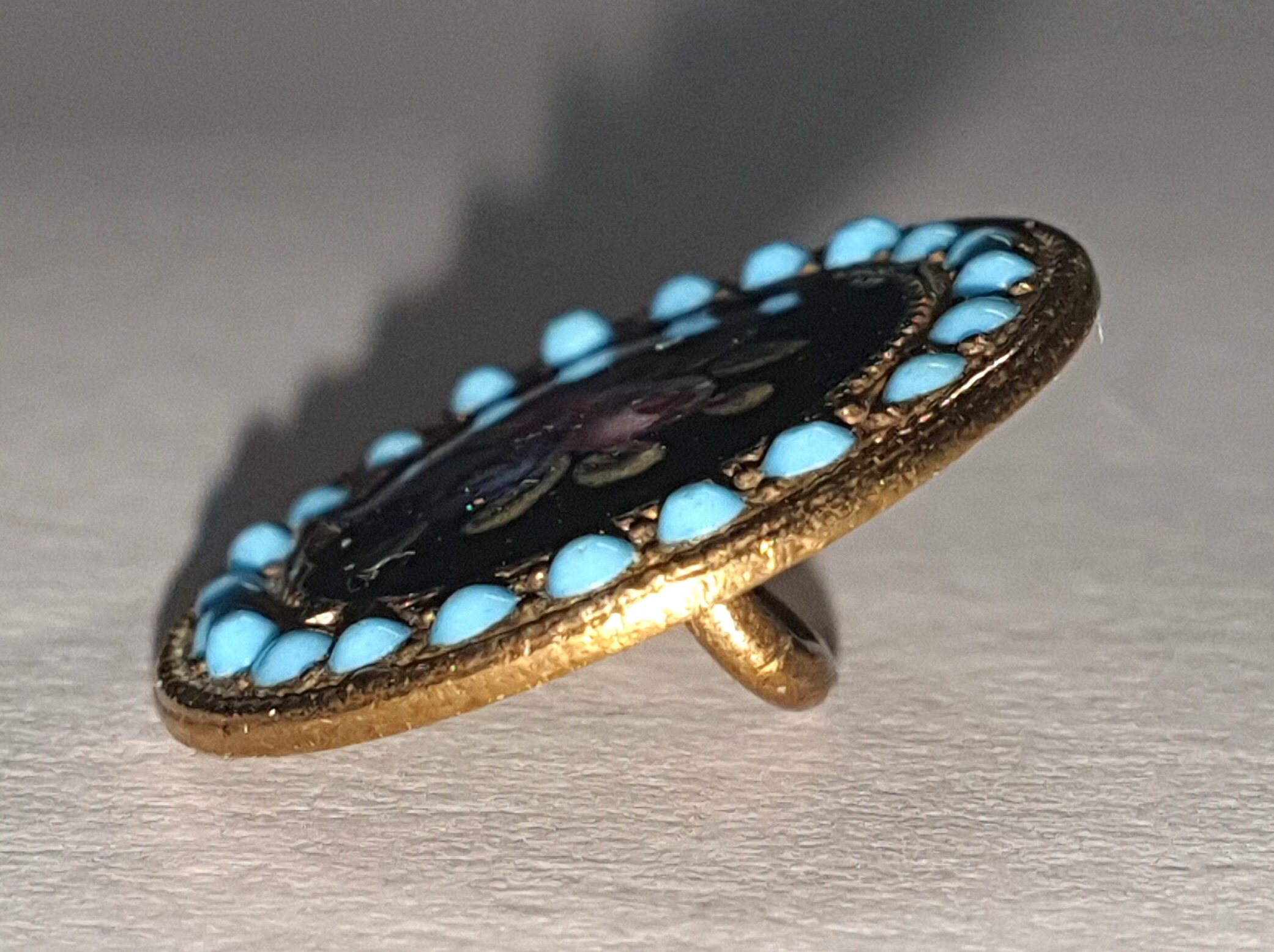 Antique Hexagonal French Enamel Button. Black Enamel Background With ...