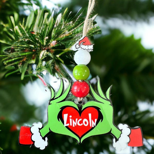 Grinch mano corazon - Etsy México