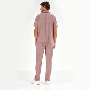 Experience Ultimate Comfort: Powder Pink Polo Unisex Medical Scrub Set ...