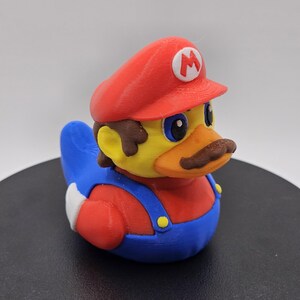 Red Plumber-inspired Jeep Duck - Nostalgic Ducking Accessory for Gamers ...