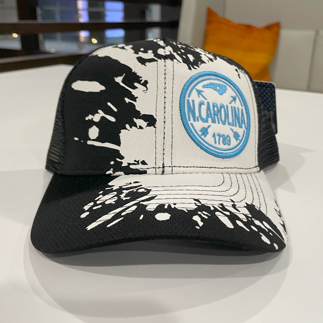 North Carolina Paint Splatter (white & Black Embroidered Cap) - North ...
