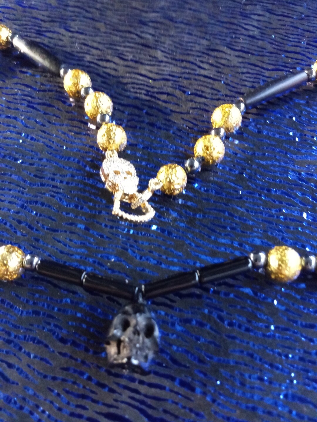 Hand Carved Buffalo Bone Skull With Lava Beads Dipped in Gold Hematite ...
