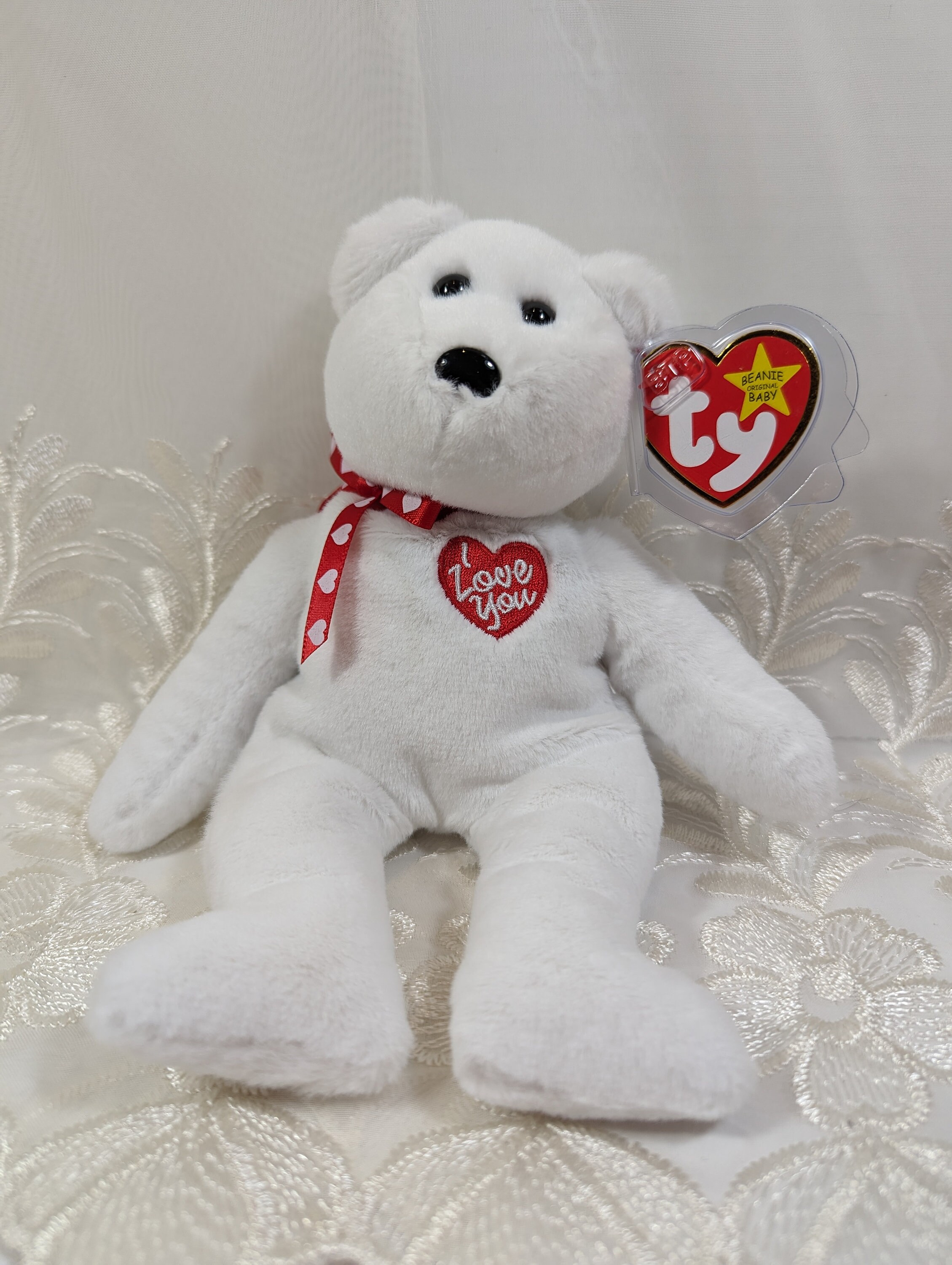 White beanie baby with red heart store