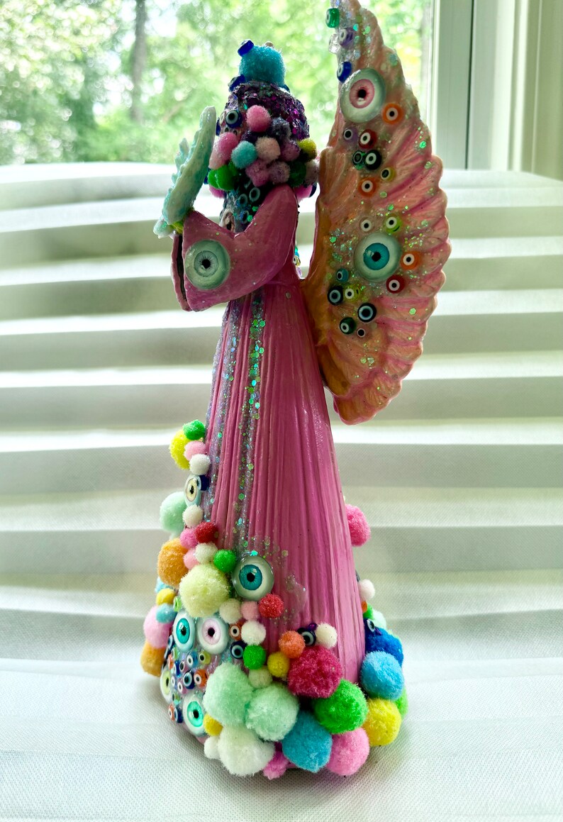 Colorful Biblically Accurate Angel Statue, Evil Eye, Cheerful Horror ...