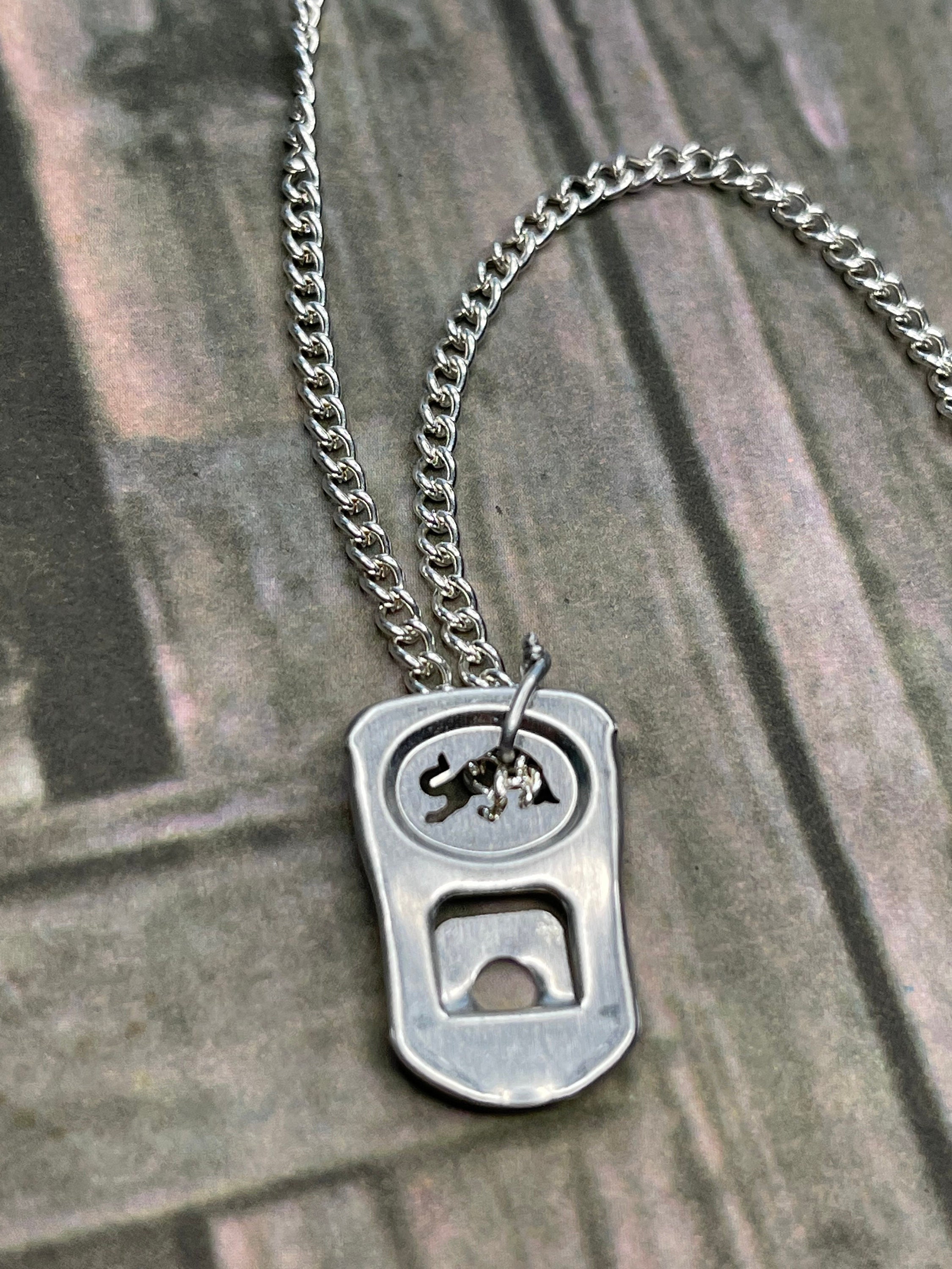Red bull necklace store