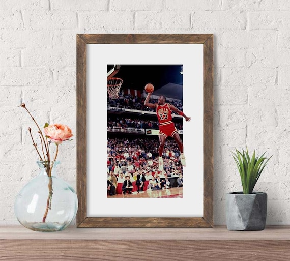 Michael Jordan Dunks From The Free Throw Line Poster