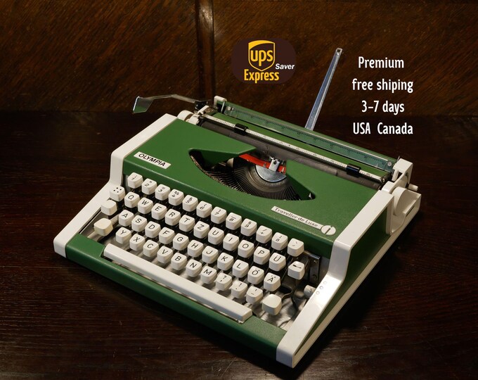 Cursive! 1960's Blue Smith Corona Electra 110 Portable Electric ...