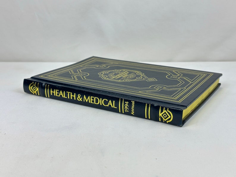 1994 the World Book Health and Medical Annual Embossed Blue & Gilt ...