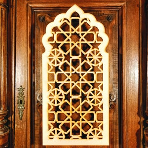 A Beautiful Wooden Wall Panel With a Mashrabiya Pattern Embedded in a ...