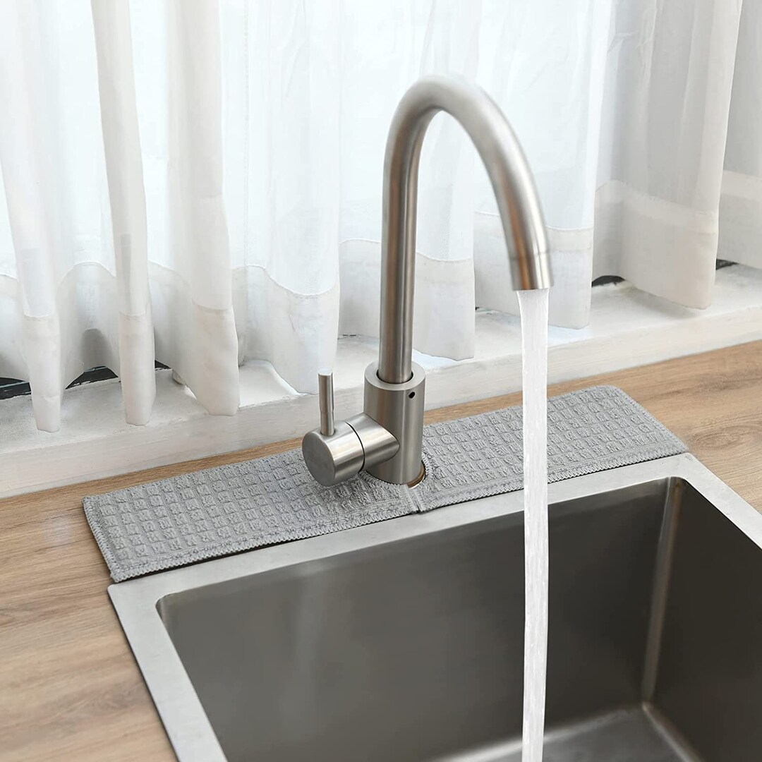 Wasserhahn Hauswand Spritzschutz