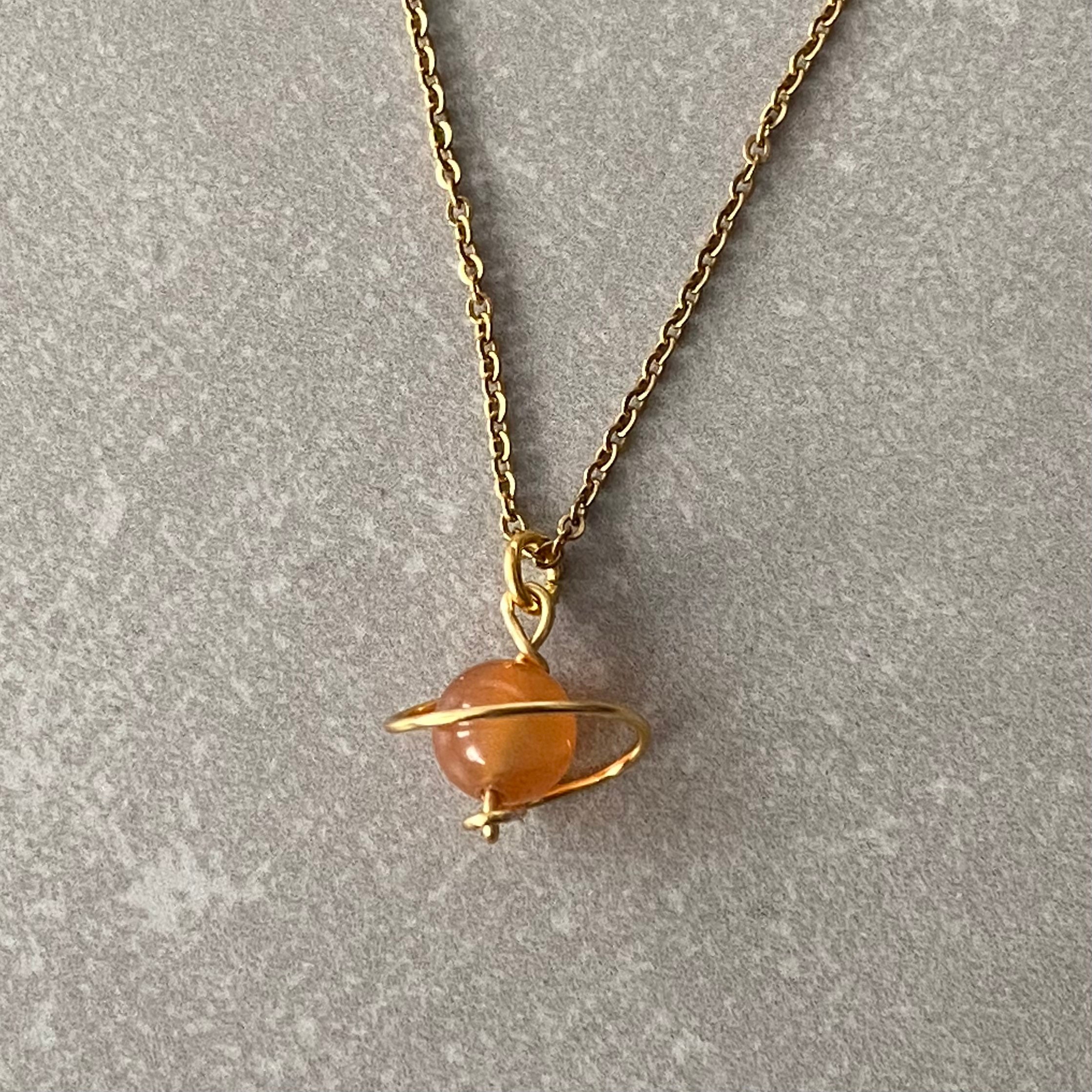 Crystal saturn necklace store