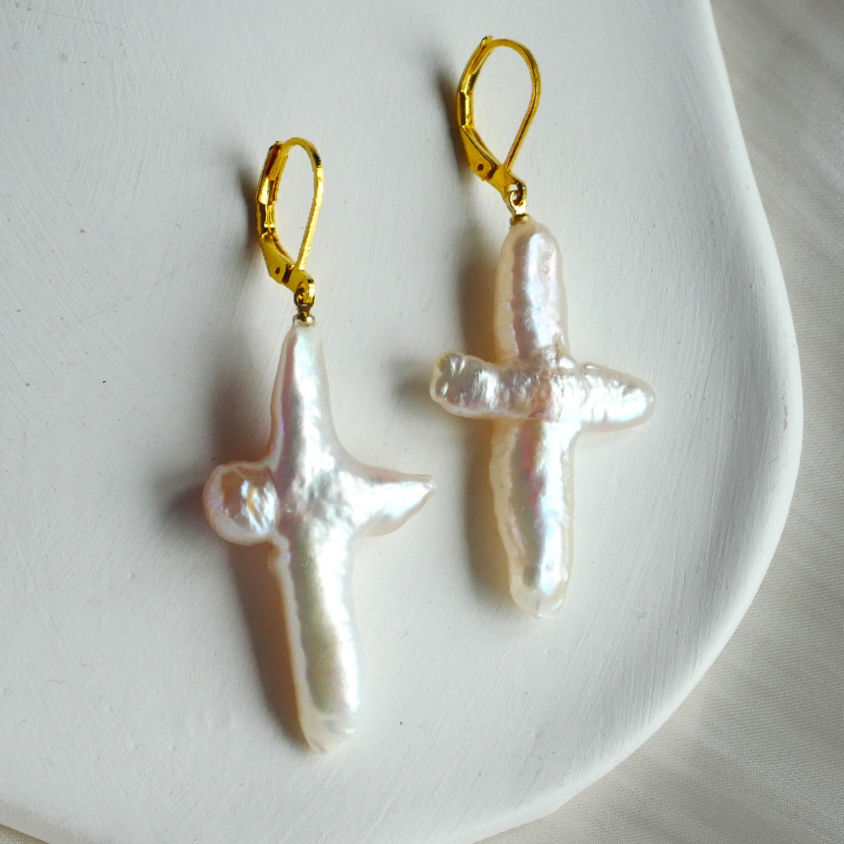 Cross pearl earrings store