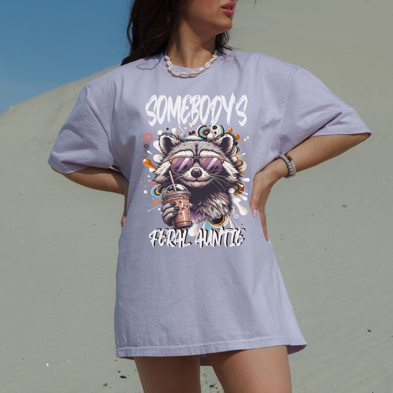 Somebodys Feral Auntie Racoon Iced Coffee Unhinged T Shirt Comfort ...