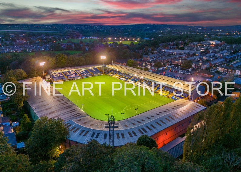 Bury Football Club, Gigg Lane Stadium at Sunset. Framed Print. the ...