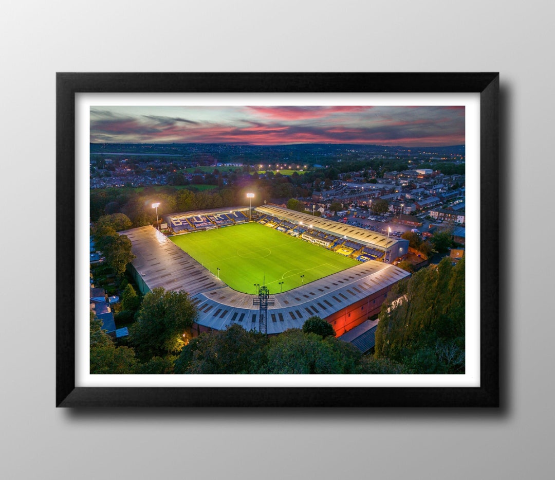 Bury Football Club, Gigg Lane Stadium at Sunset. Framed Print. the ...