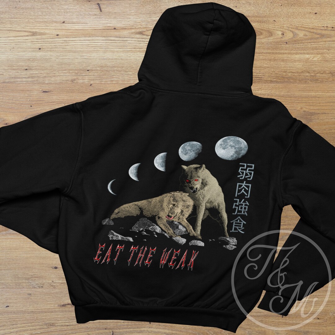 Eat the Weak Wolf & Moon Phase Back Design on Unisex Heavy Blend Hooded ...