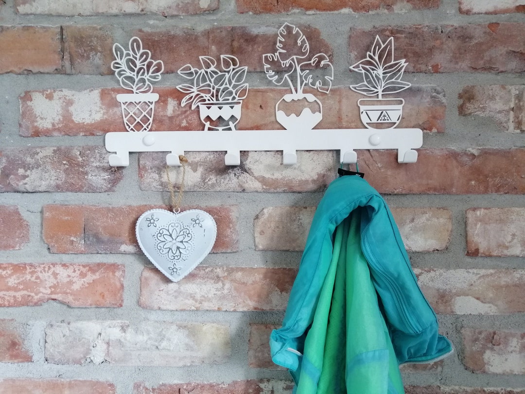 Vintage Floral Charm: Metal Clothes Hanger With Delicate Flower Motif ...